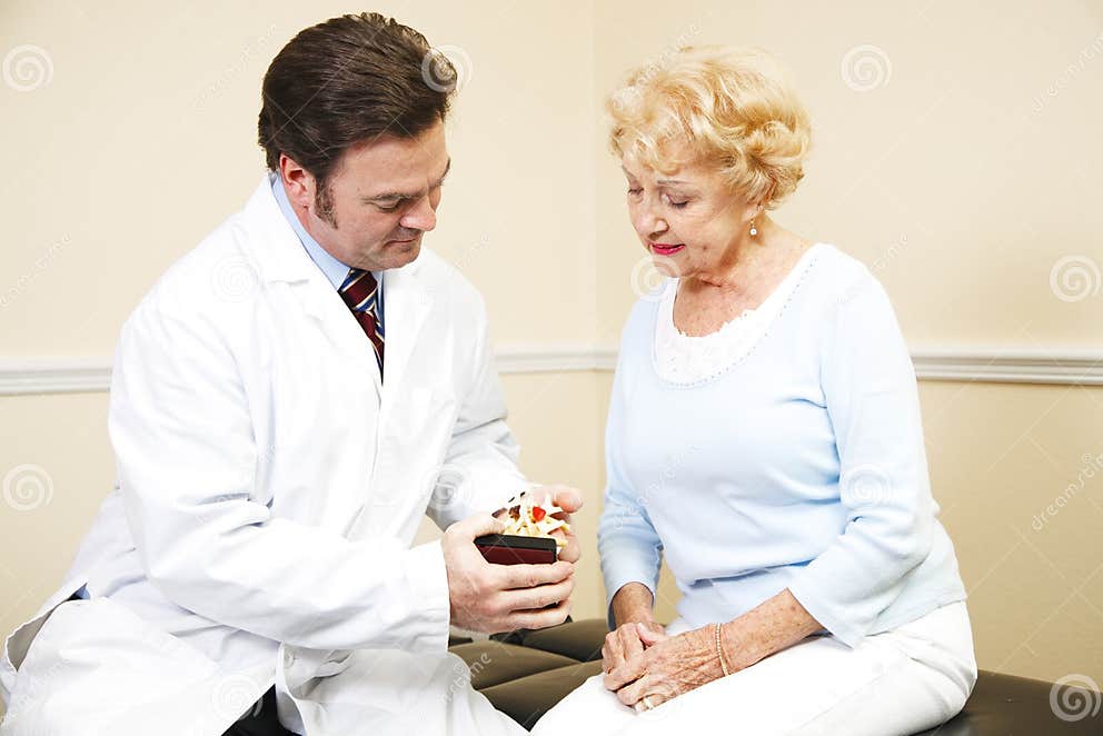 Chiropractor with Spine Model Stock Photo - Image of healthcare, female ...