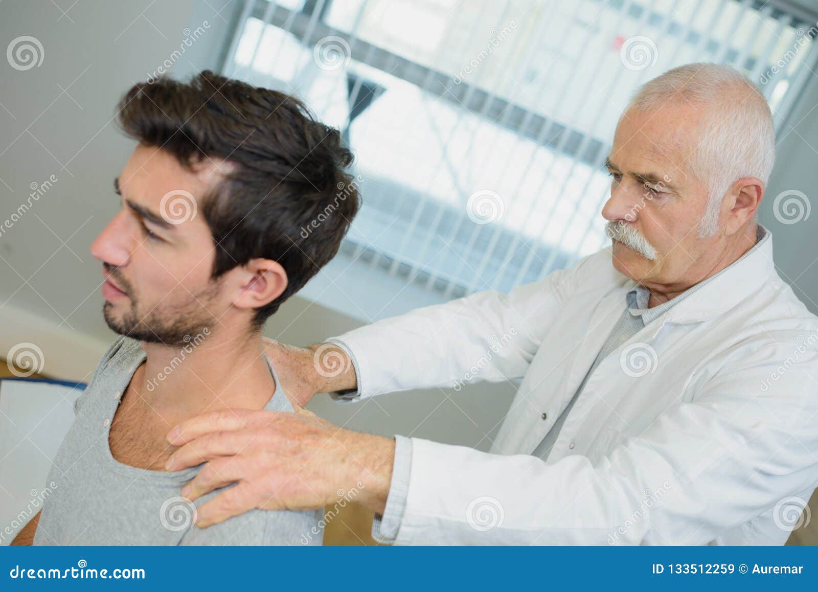 Chiropractor Working on Young Man`s Back Stock Image - Image of male ...
