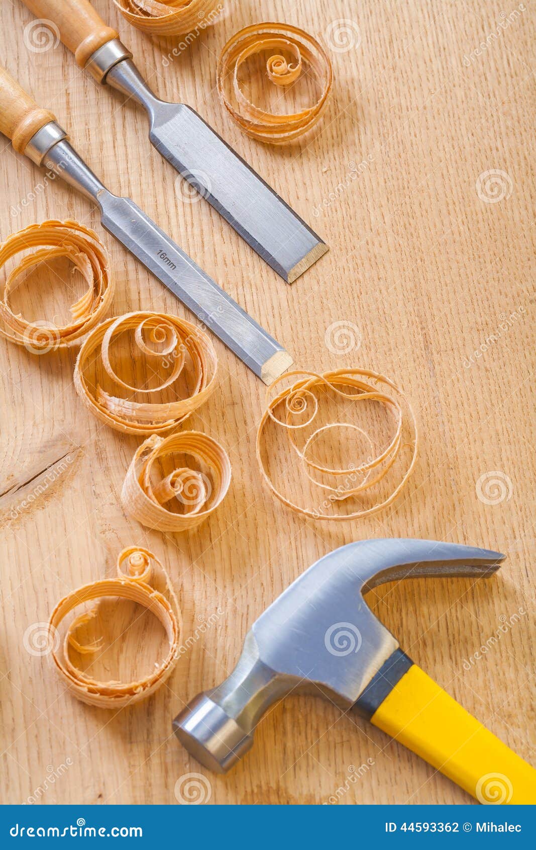 Chisel and Claw Hammer with Wooden Shavings on Board Stock Photo ...