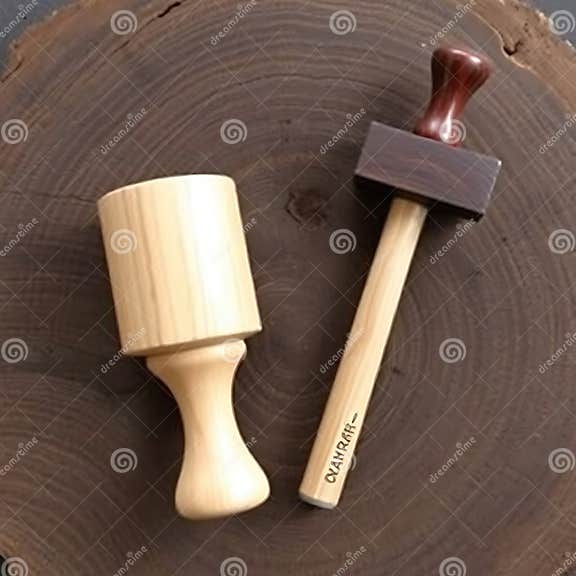 Chisel and Mallet Placed Side by Side on a Piece of Dark Oak Wood with ...