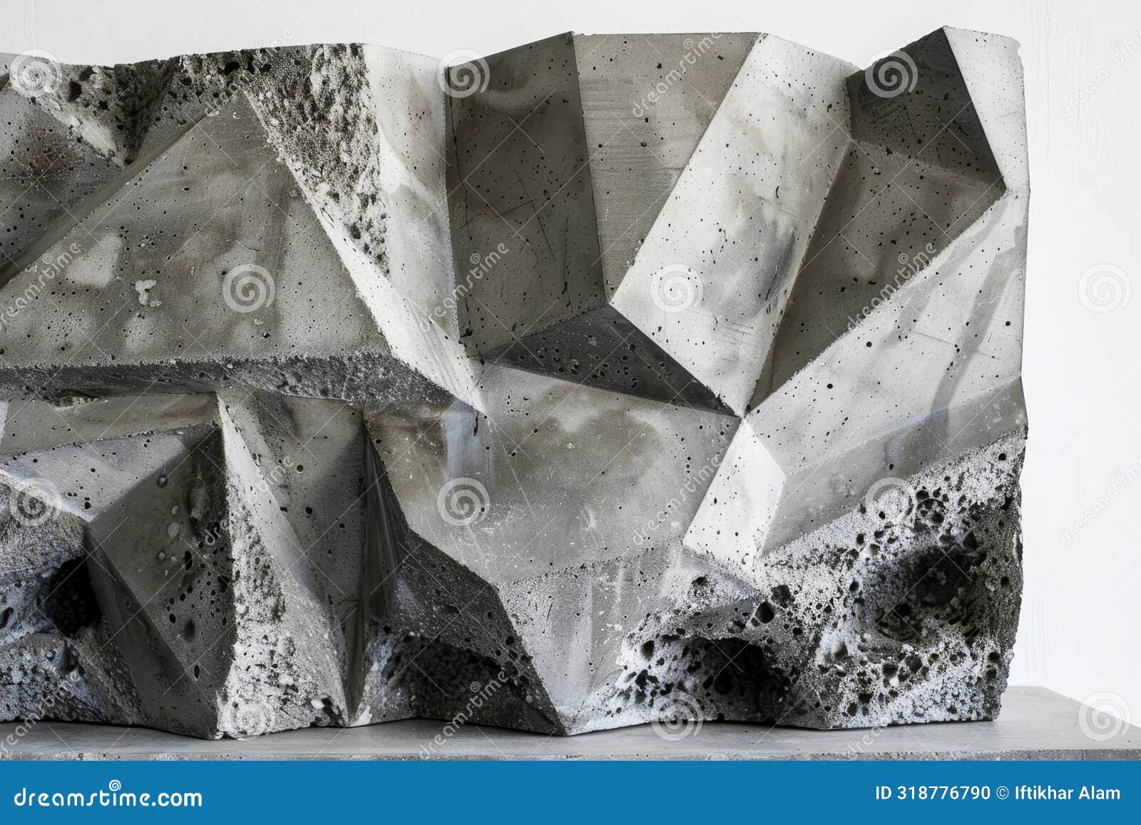 A Chiseled Concrete Block with Sharp Edges and Angular Features Placed ...