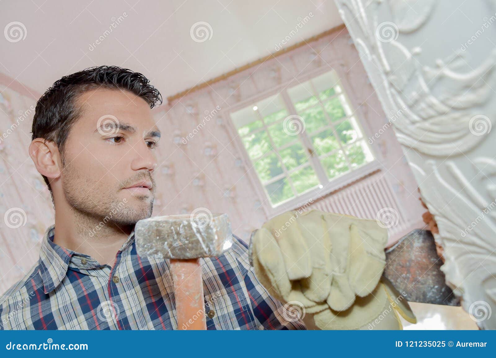 Chiselling at a wall stock image. Image of builder, house - 121235025