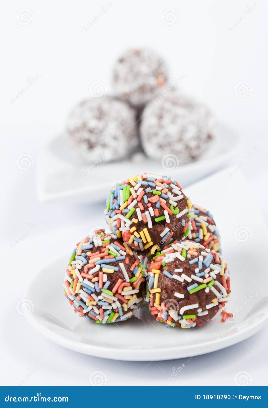 Chocolate Balls with Colorful Toppings on White Stock Photo - Image of ...