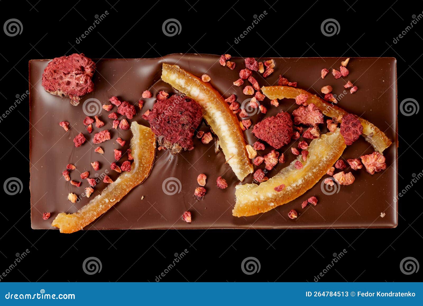 Chocolate Bar with Candied Orange Peel and Raspberry Isolated on Black ...