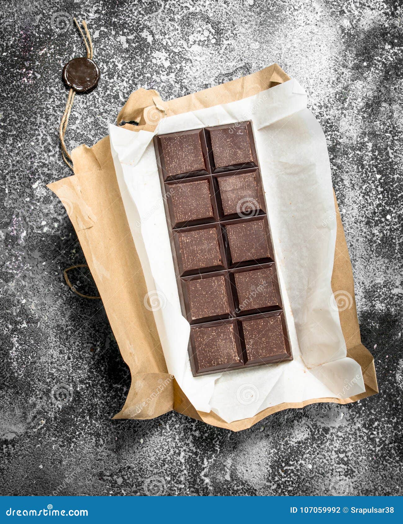 Chocolate Bar in a Paper Wrapper. Stock Photo - Image of delicious ...