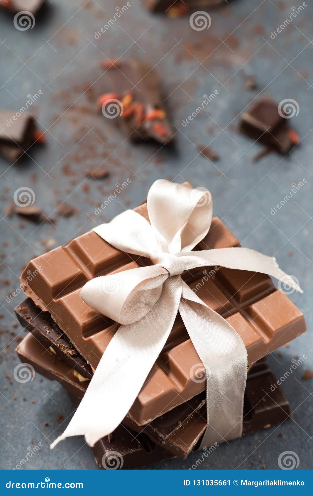 Chocolate Bars with Beige Bow on a Grey Background Stock Image - Image ...