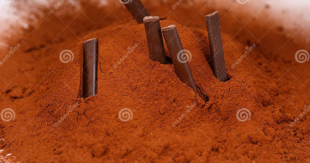 Chocolate Bars Falling on Black Chocolate Powder Stock Photo - Image of ...