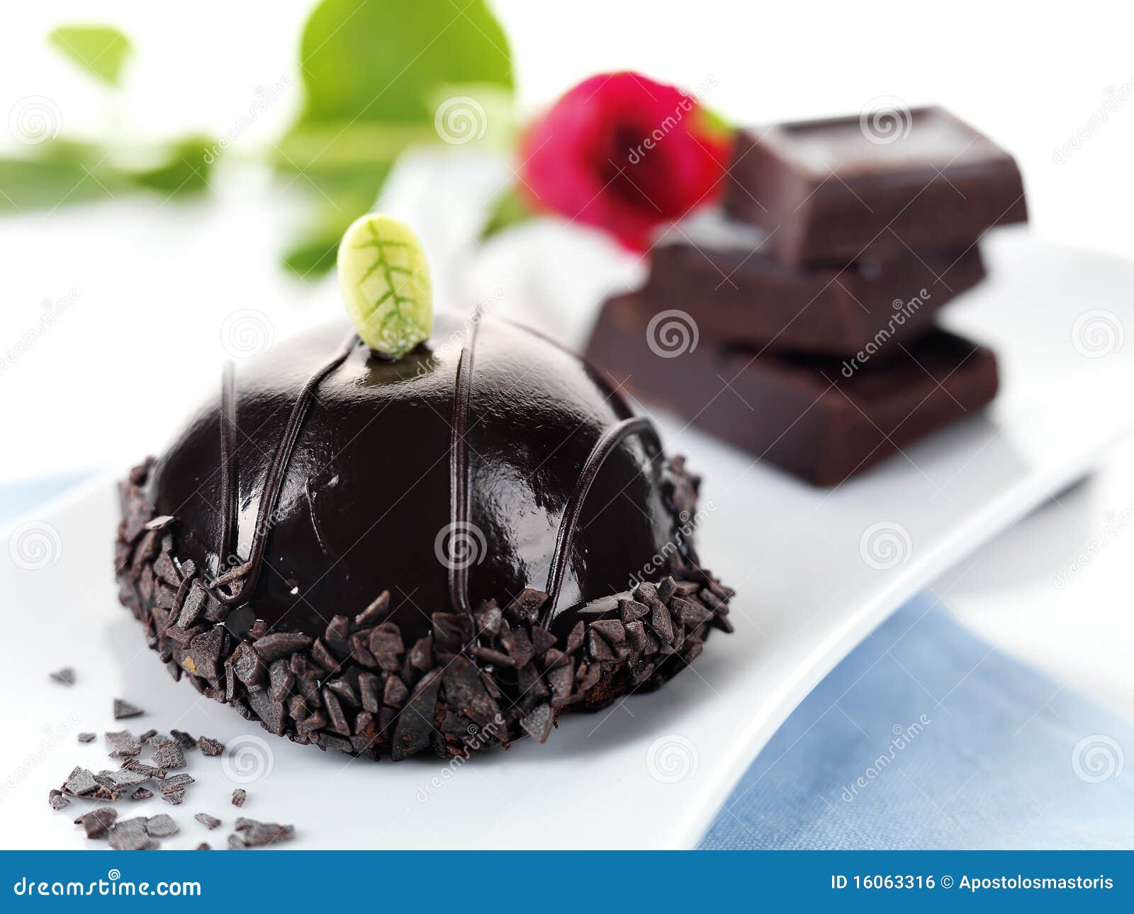 Chocolate Bomb Pastry with a Red Rose Stock Photo - Image of pieces ...