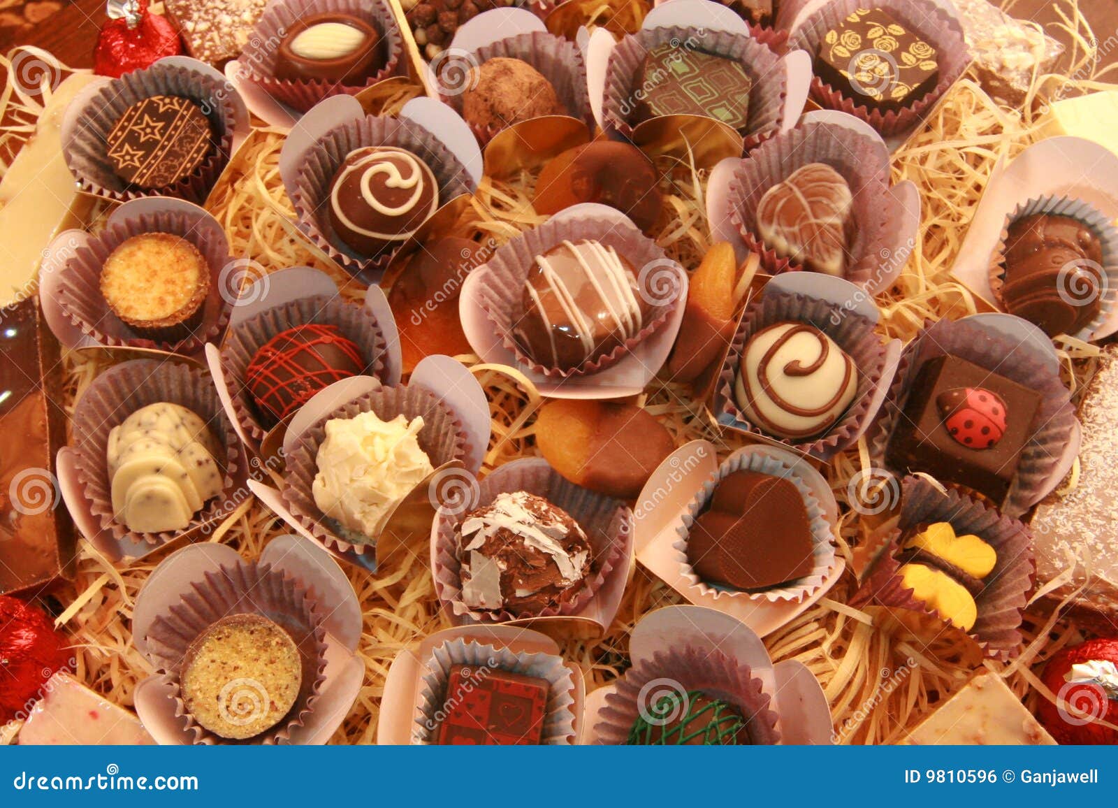 Chocolate bonbons stock photo. Image of food, foil, delicious - 9810596