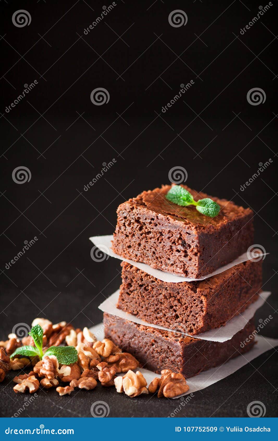 Chocolate Brownie Square Pieces in Stack on White Plate with Walnuts ...