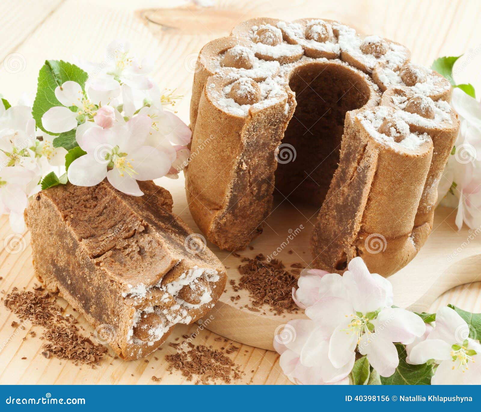 Chocolate Cake and Branches of Blossom Apple Tree Stock Photo - Image ...