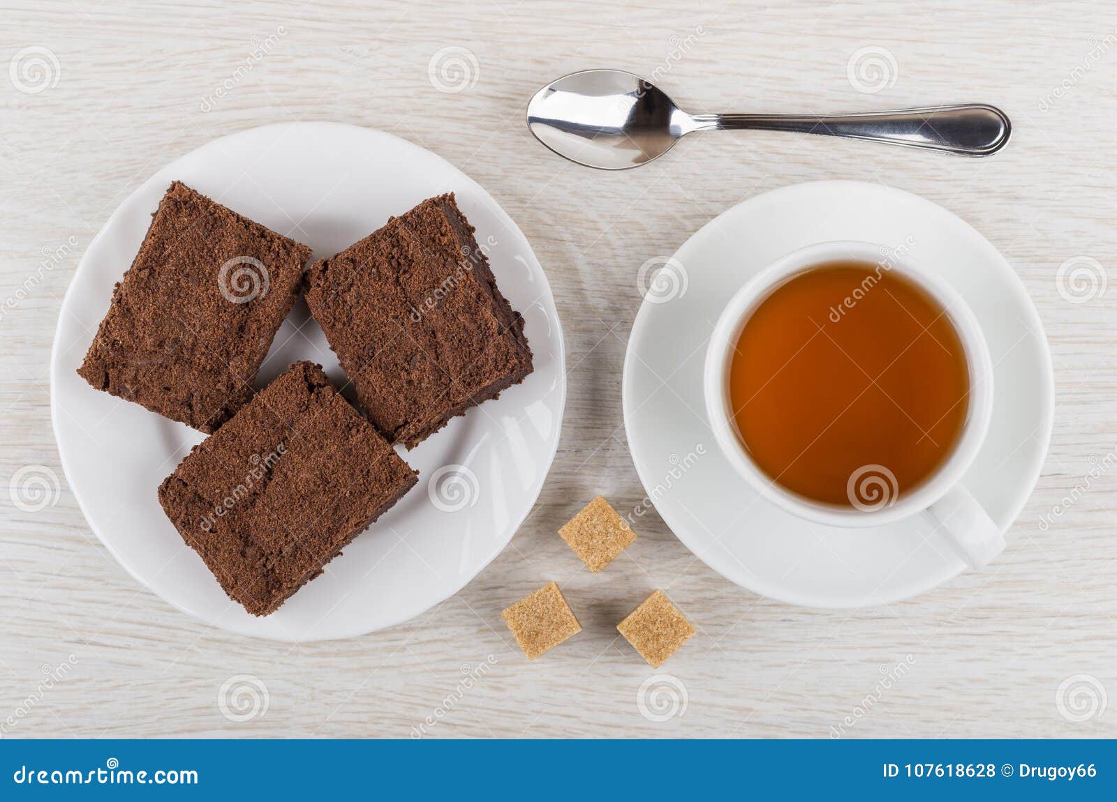 Chocolate Cake in Plate, Teaspoon, Sugar and Cup of Tea Stock Photo ...