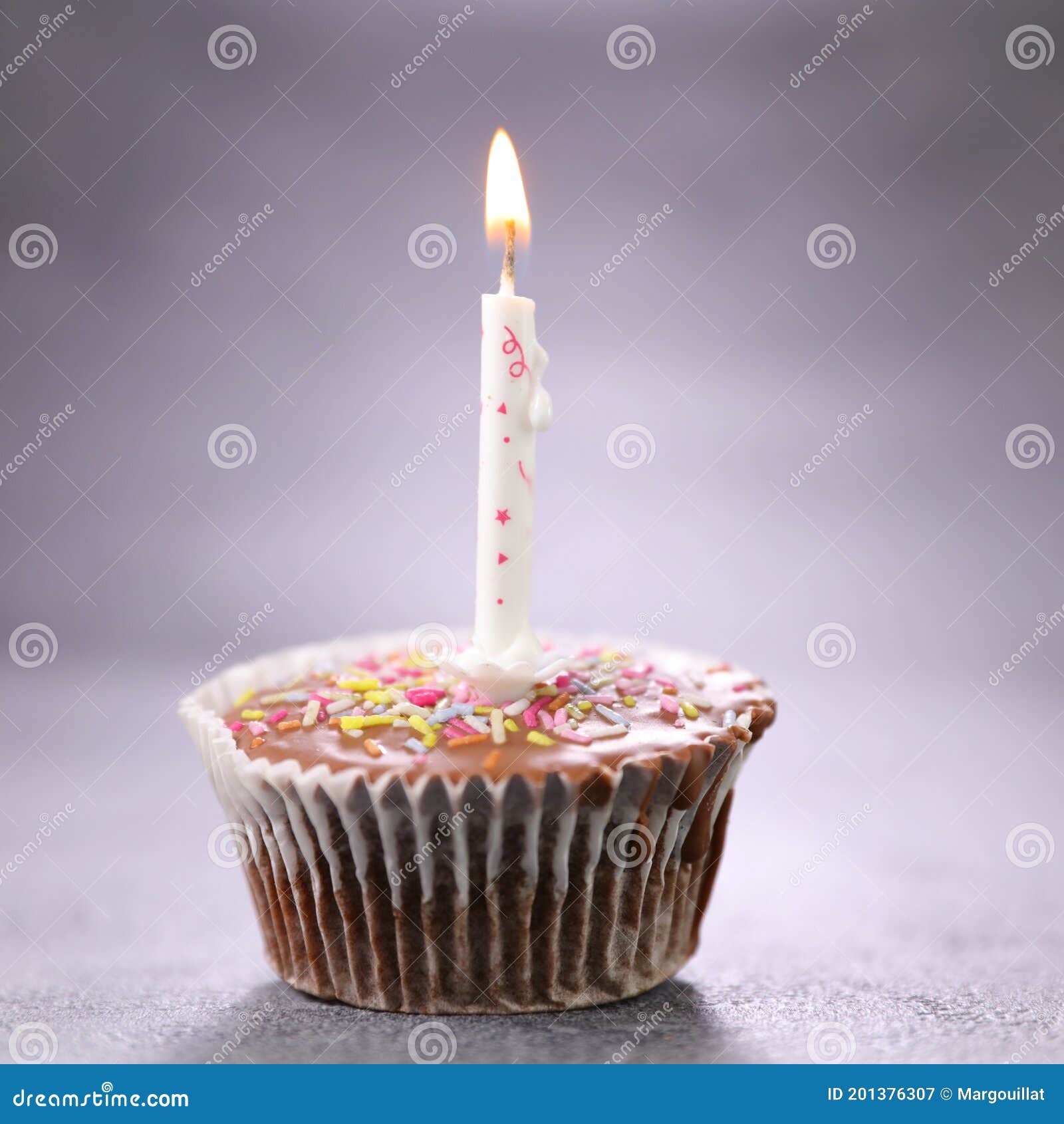 Chocolate cake and candle stock image. Image of single - 201376307