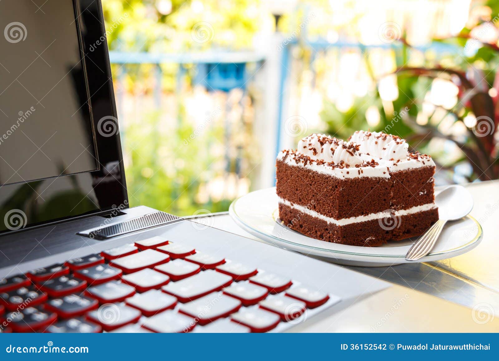 Chocolate Cakes and Notebook Computer Stock Photo - Image of breakfast ...