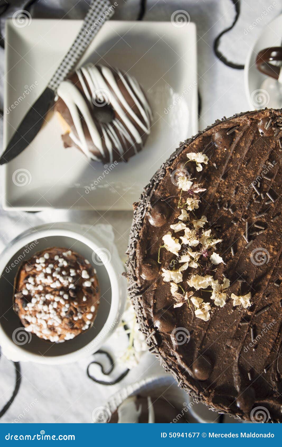 Chocolate cakes table stock image. Image of kingdom, cakes - 50941677