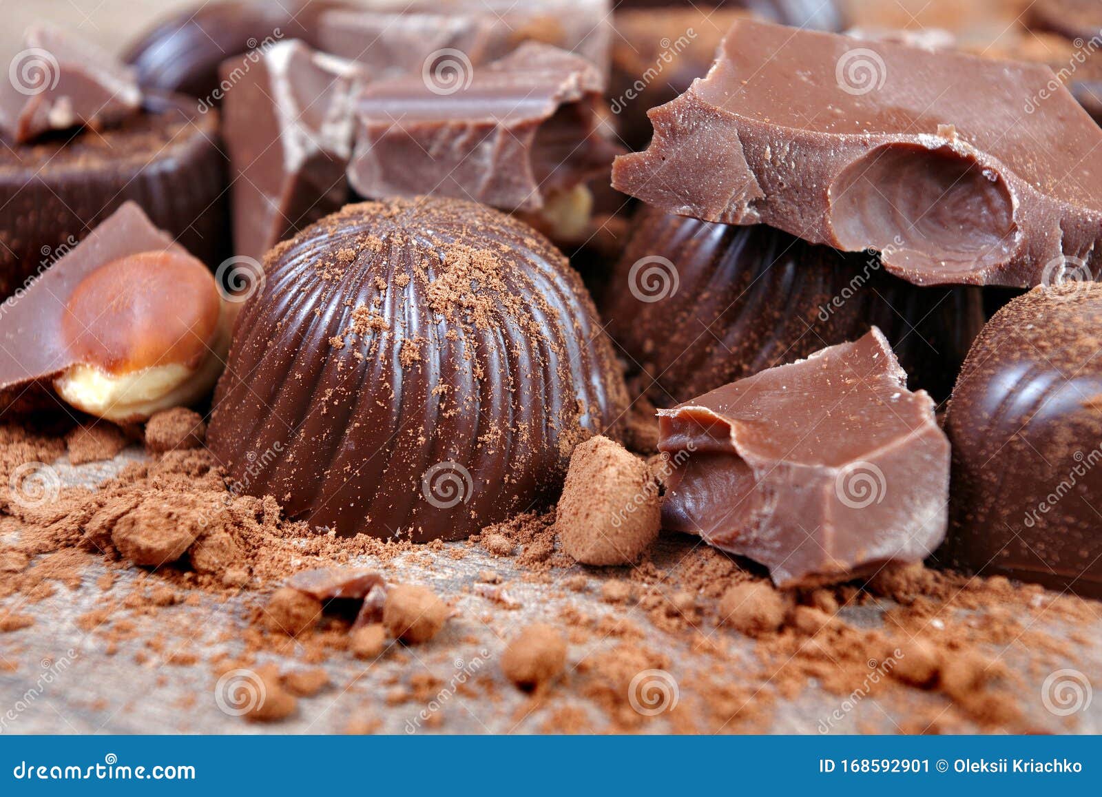 Chocolate Candies and Cocoa Powder on the Table. Stock Image - Image of ...
