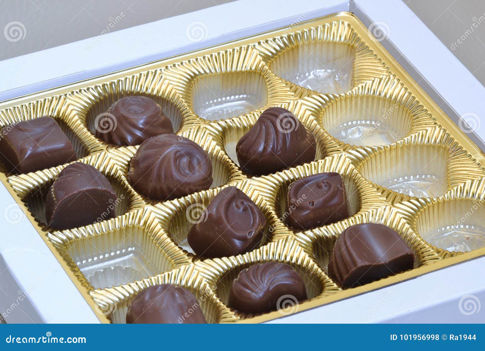 Chocolate Candies in Incomplete Box Stock Photo - Image of choco, close ...