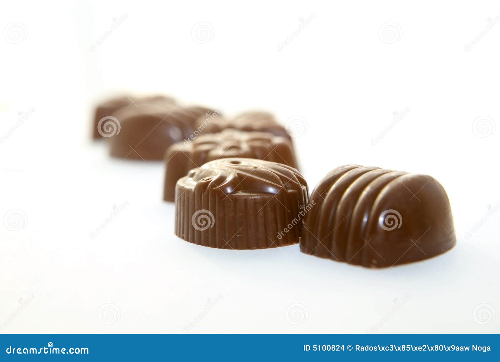 Chocolate candies in line stock photo. Image of candys - 5100824