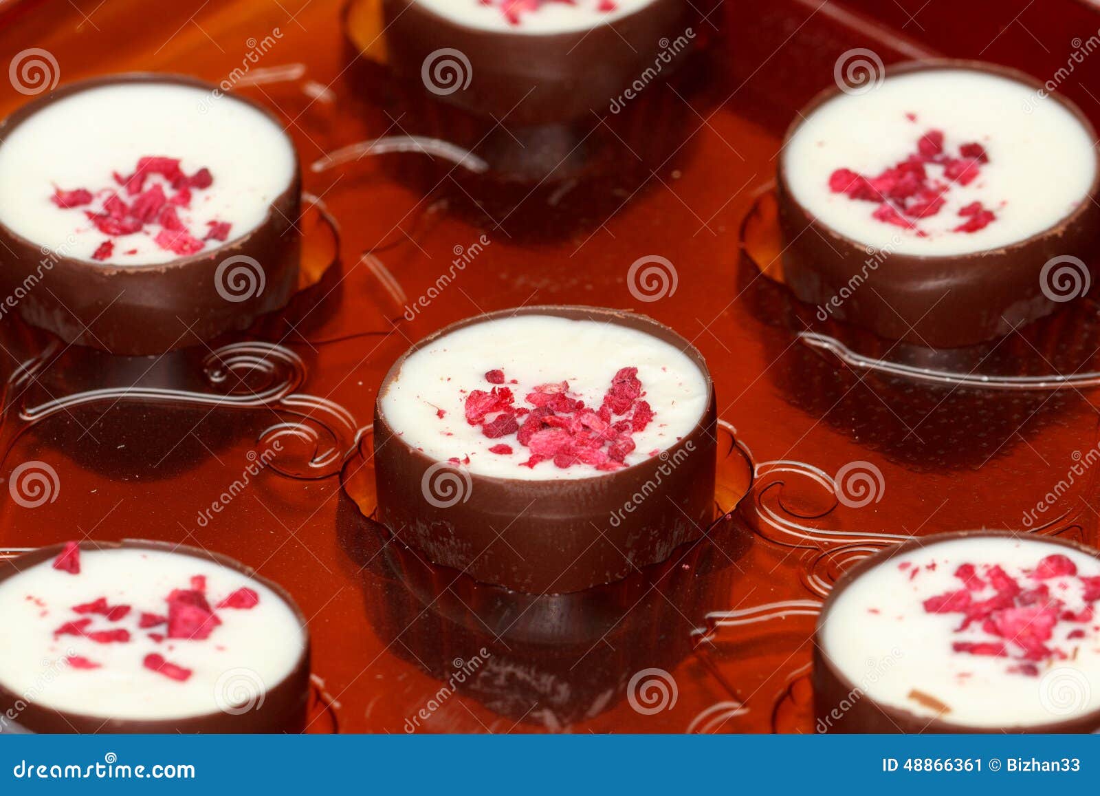 Chocolate Candies with Raspberry Stock Image - Image of gift, group ...