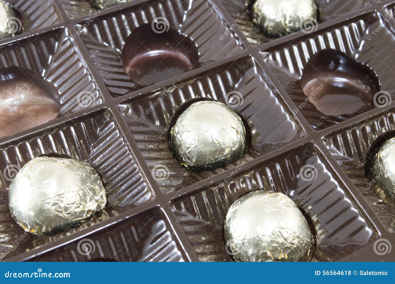 Chocolate Candies Wrapped in Golden Coloured Packaging Stock Photo ...
