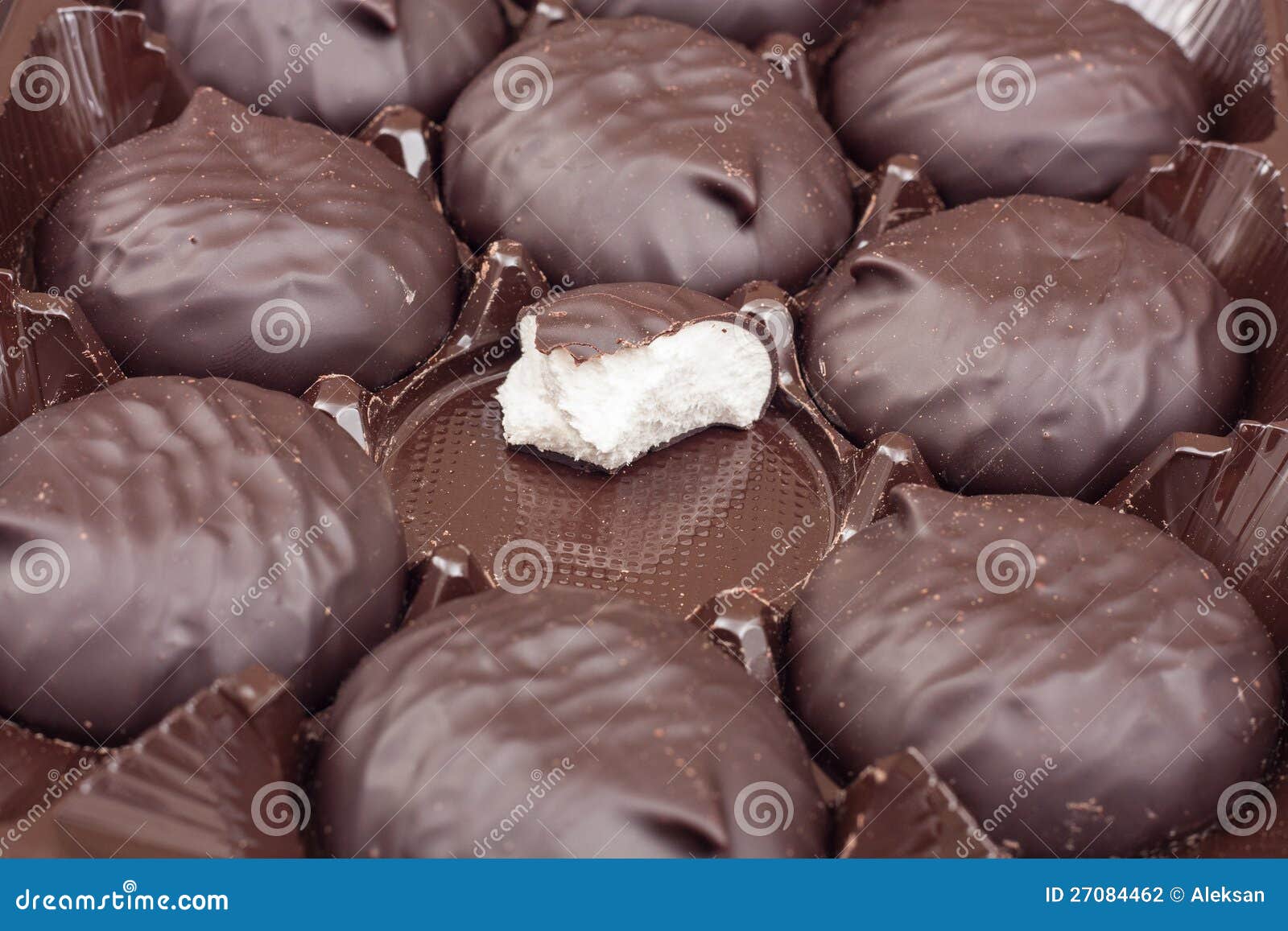 Chocolate Candy Bitten in Half. Stock Photo - Image of candy, contrast ...