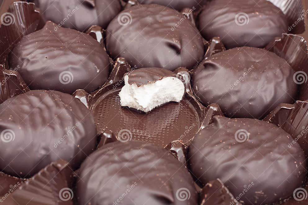Chocolate Candy Bitten in Half. Stock Photo - Image of candy, contrast ...