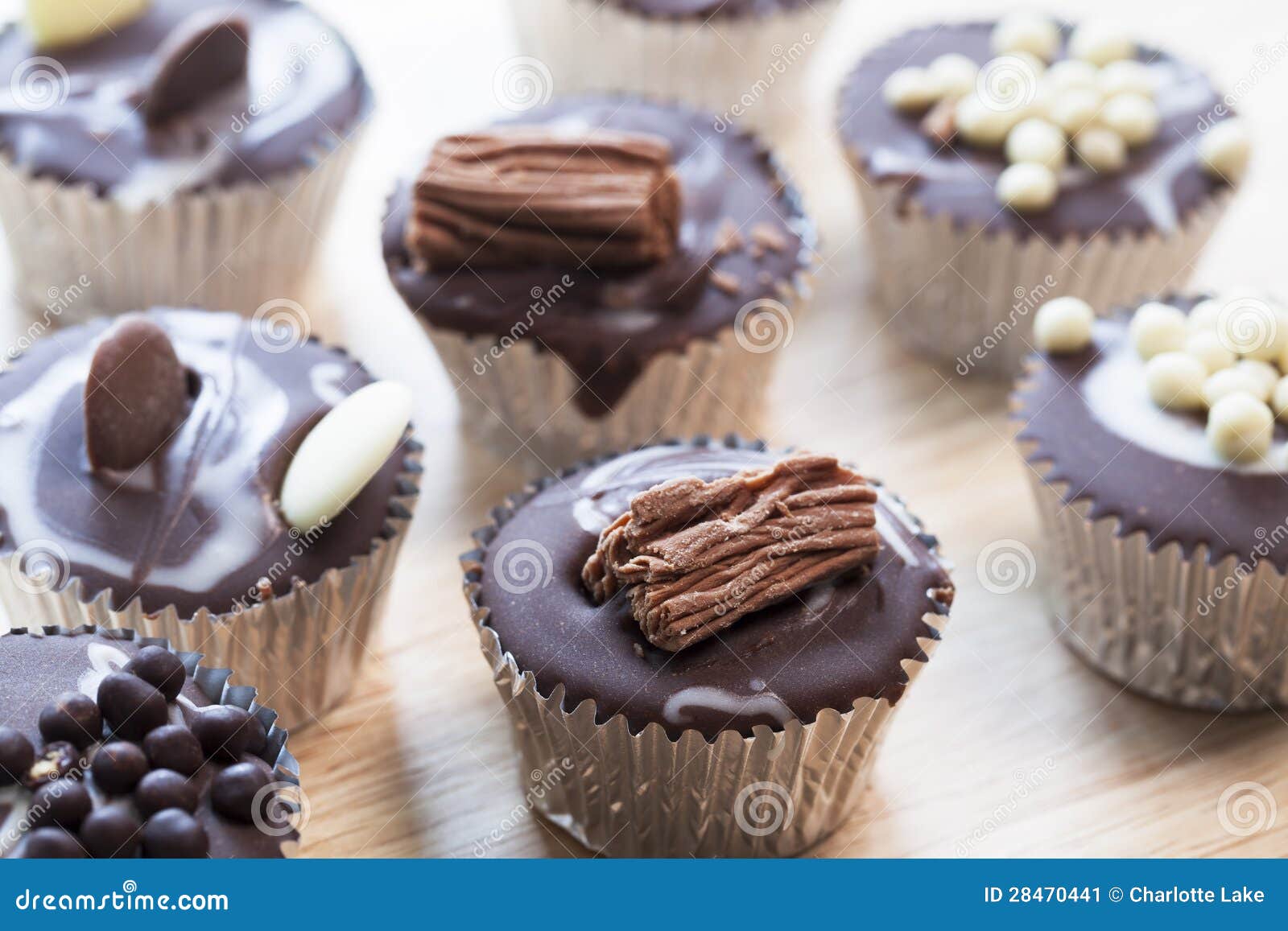 Chocolate Candy Cupcakes stock image. Image of temptation - 28470441