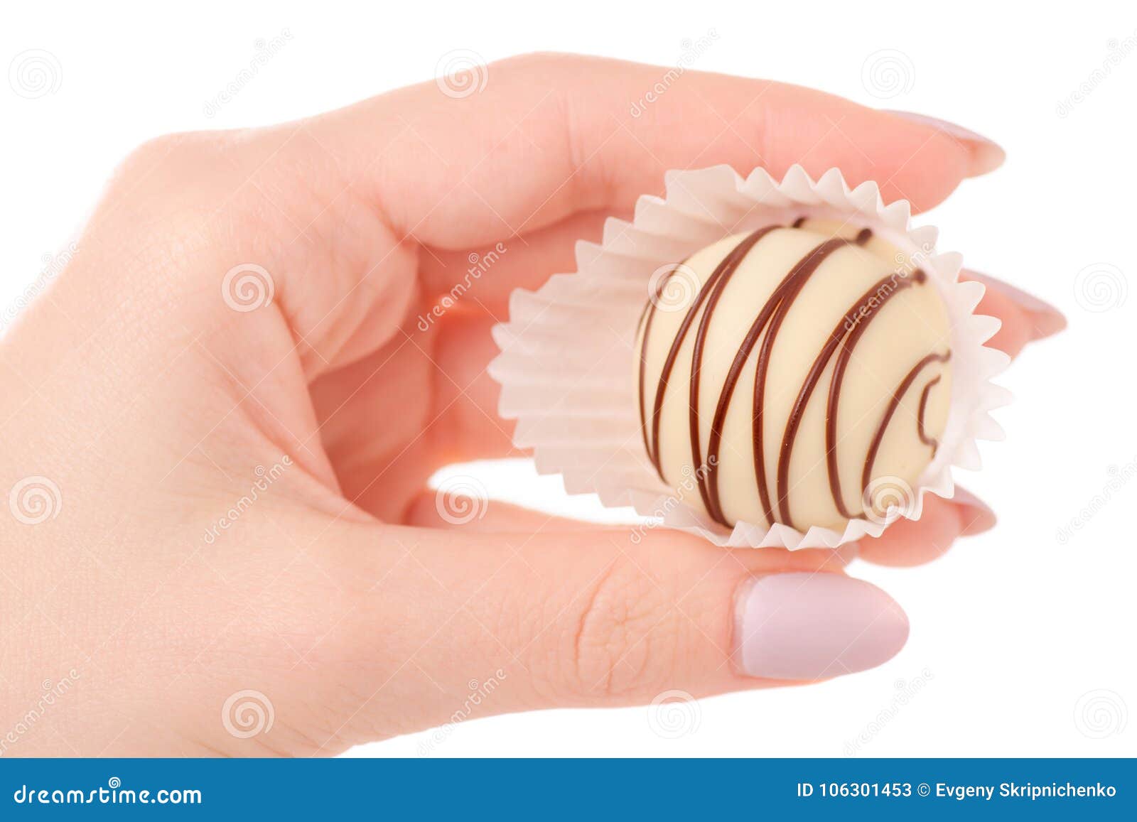 Chocolate candy in hand stock image. Image of block - 106301453