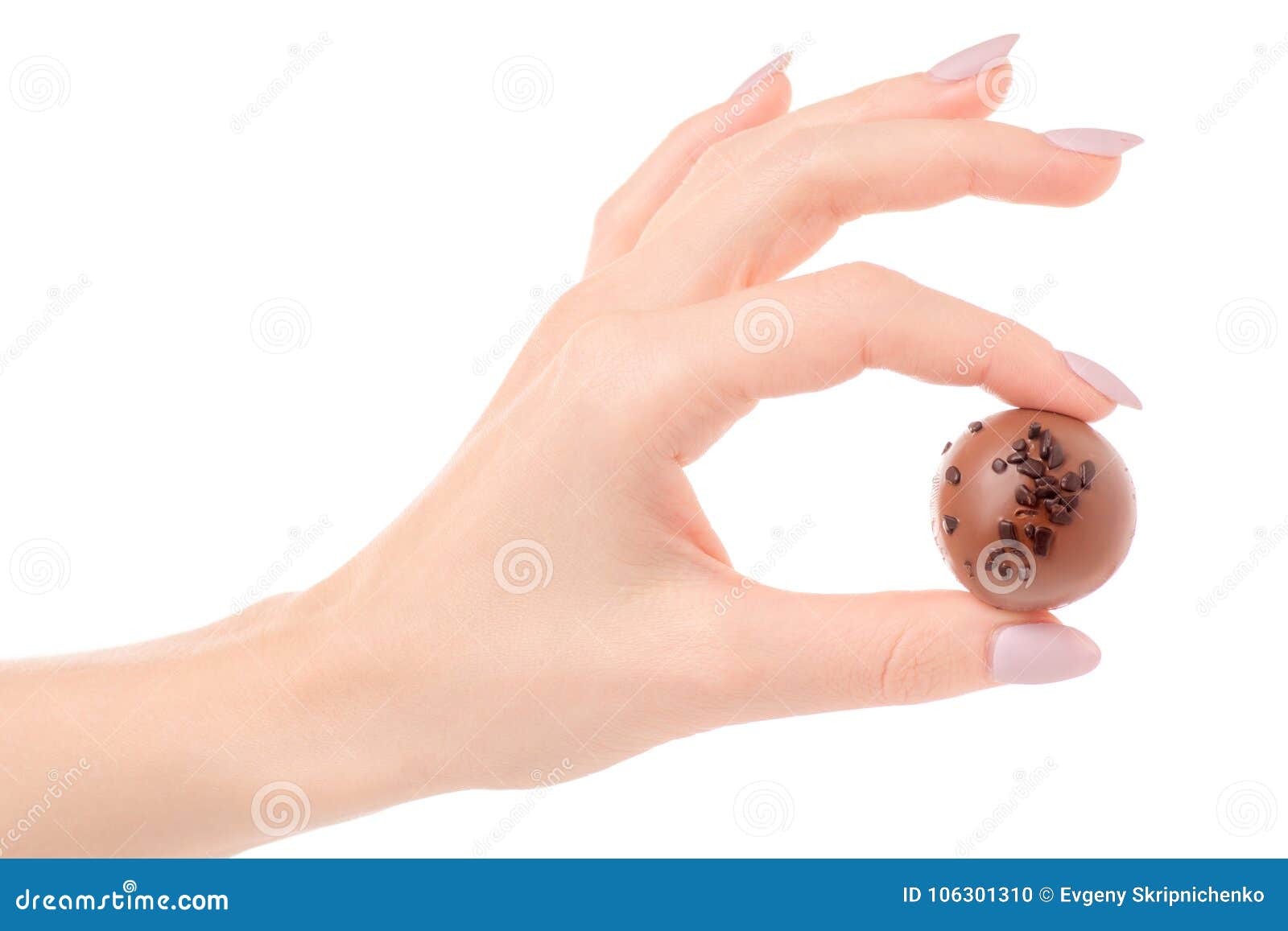 Chocolate candy in hand stock photo. Image of color - 106301310