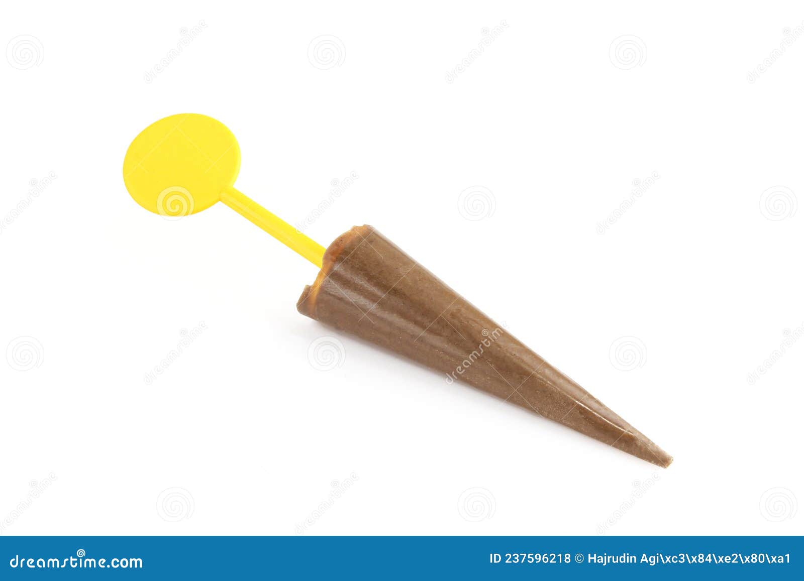 Chocolate Candy Snack for Kids on Plastic Yellow Stick Isolated on ...