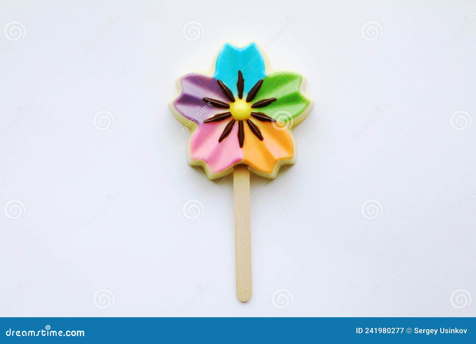 Chocolate candy on a stick stock image. Image of white - 241980277