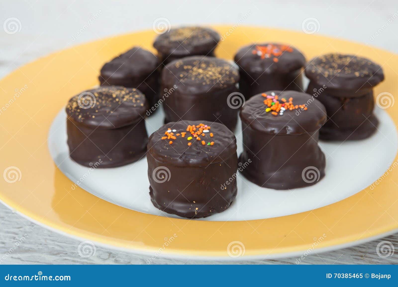 Chocolate Candy with Topping Stock Image - Image of cream, food: 70385465