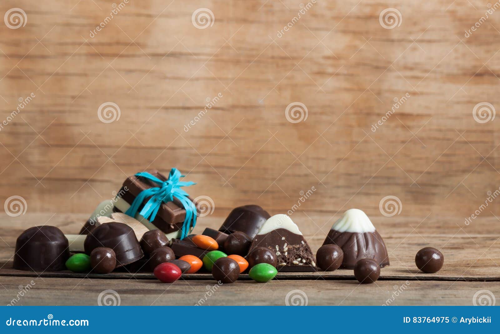 Chocolate Candy on Wood Desk Stock Image - Image of background, brown ...
