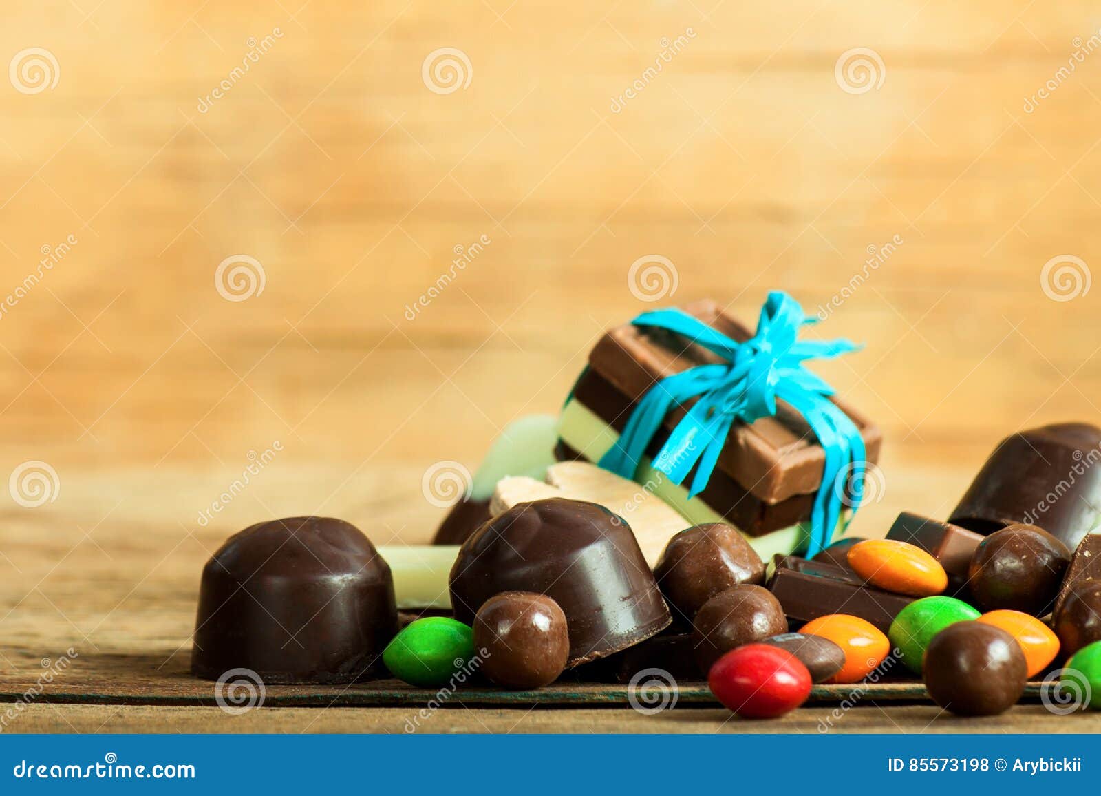 Chocolate Candy on Wood Desk Stock Photo - Image of candy, treat: 85573198