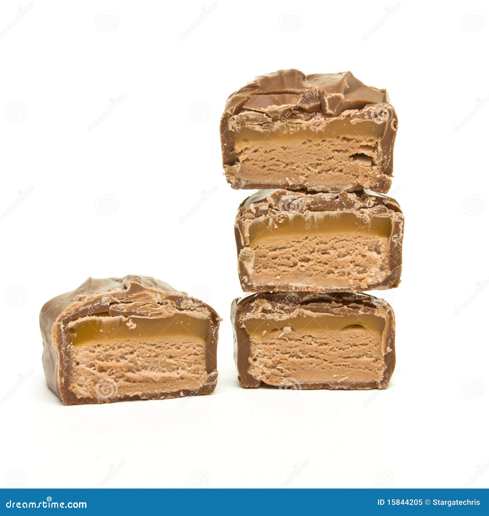 Chocolate, Caramel Flowing Beautiful Drops On A White Background ...