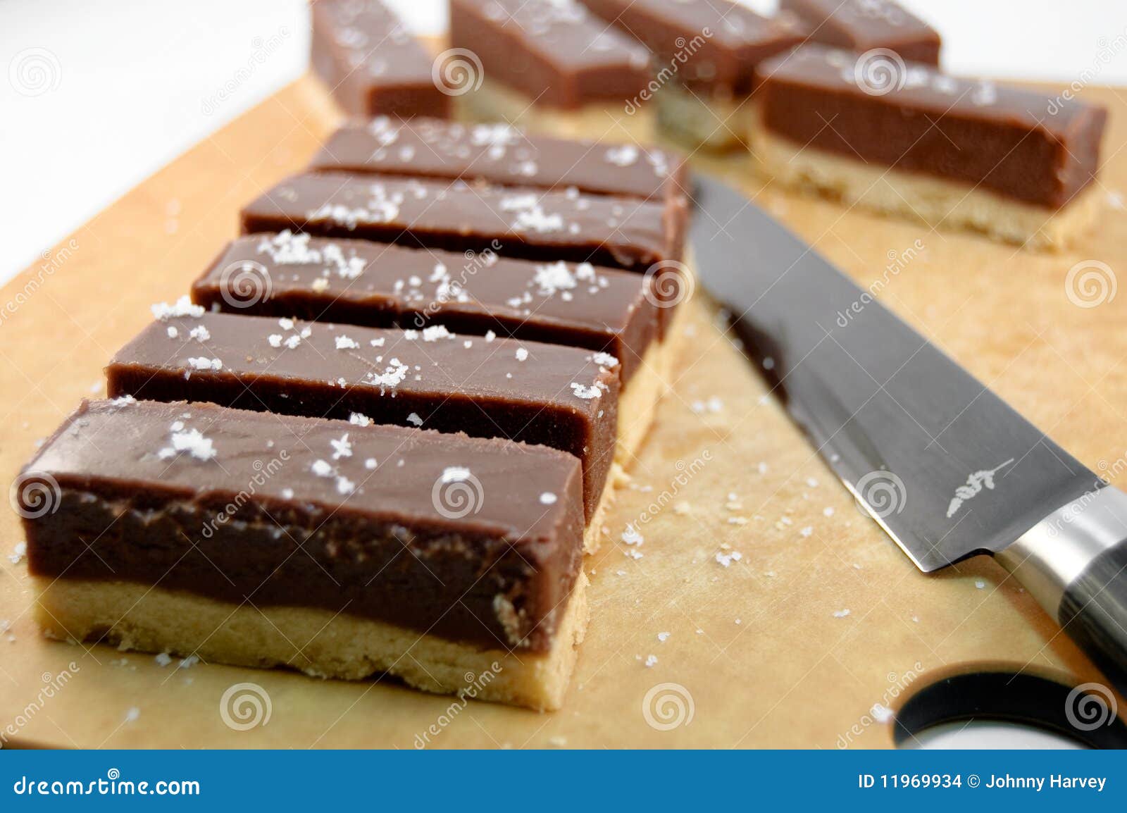 Chocolate, Caramel Flowing Beautiful Drops On A White Background ...