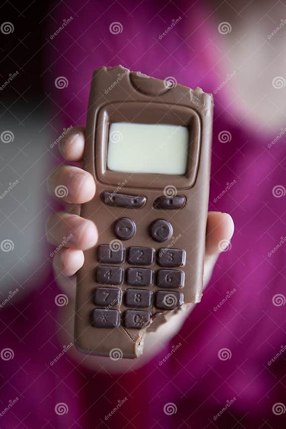 Chocolate Cell Phone Held by Child. Stock Image - Image of marks, teeth ...