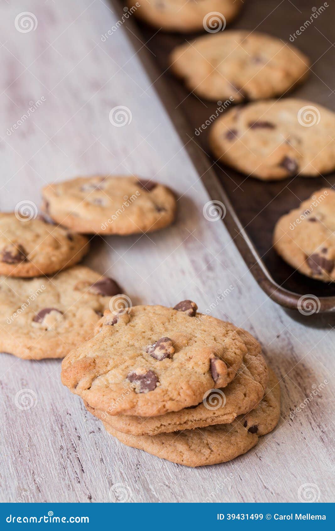 Chocolate Chip Cookies in a Row and on Cookie Sheet Stock Image - Image ...