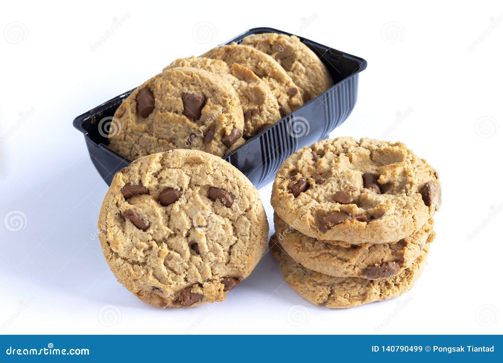 Chocolate Chip Cookies Stacked on White Table and Cookies in the ...