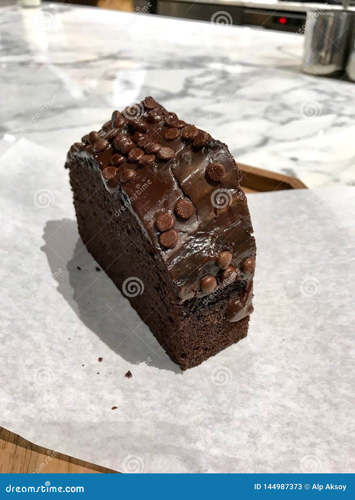 Chocolate Chip Sponge Cake Slice with Coffee on Marble Surface Stock ...