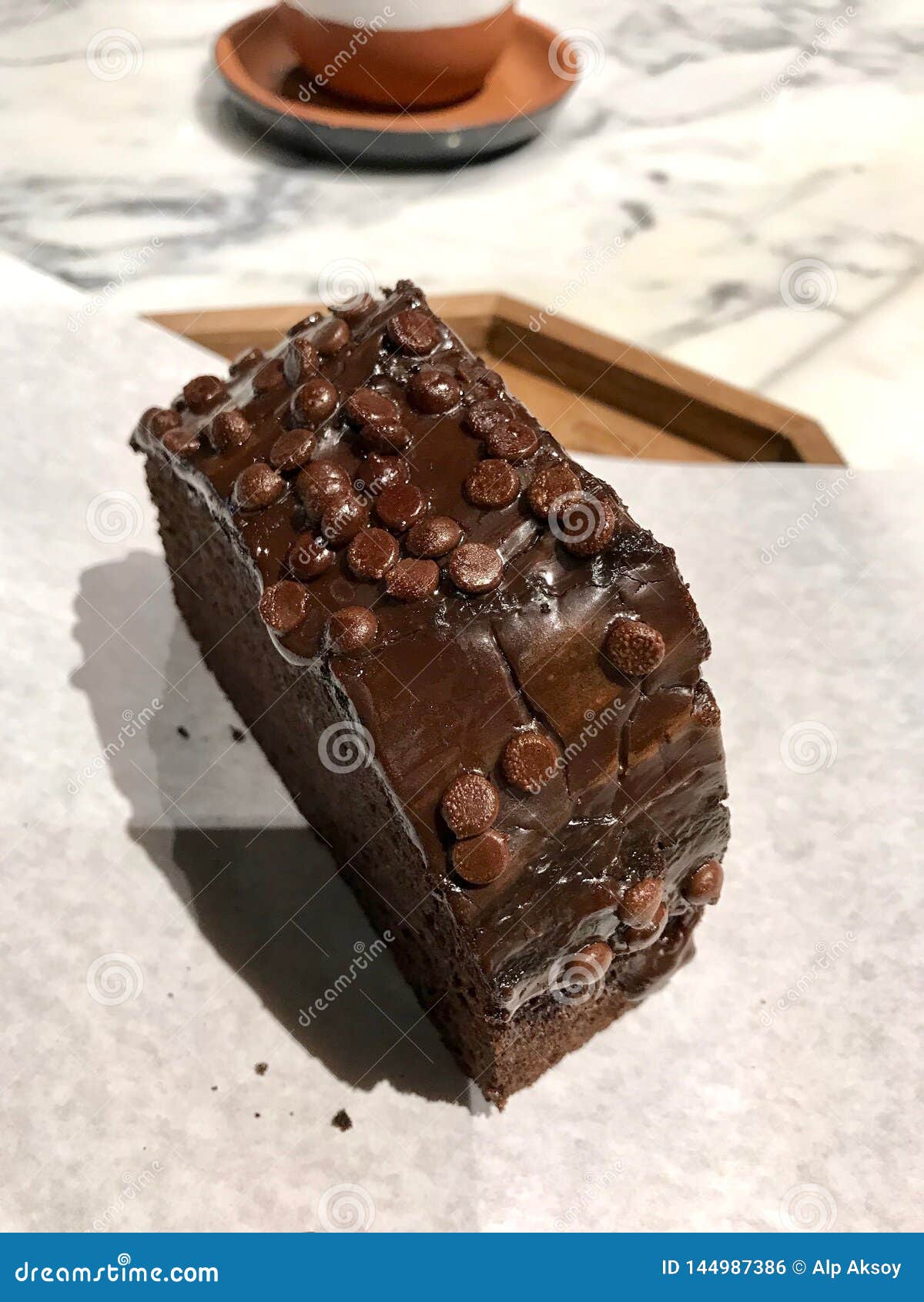 Chocolate Chip Sponge Cake Slice with Coffee on Marble Surface Stock ...