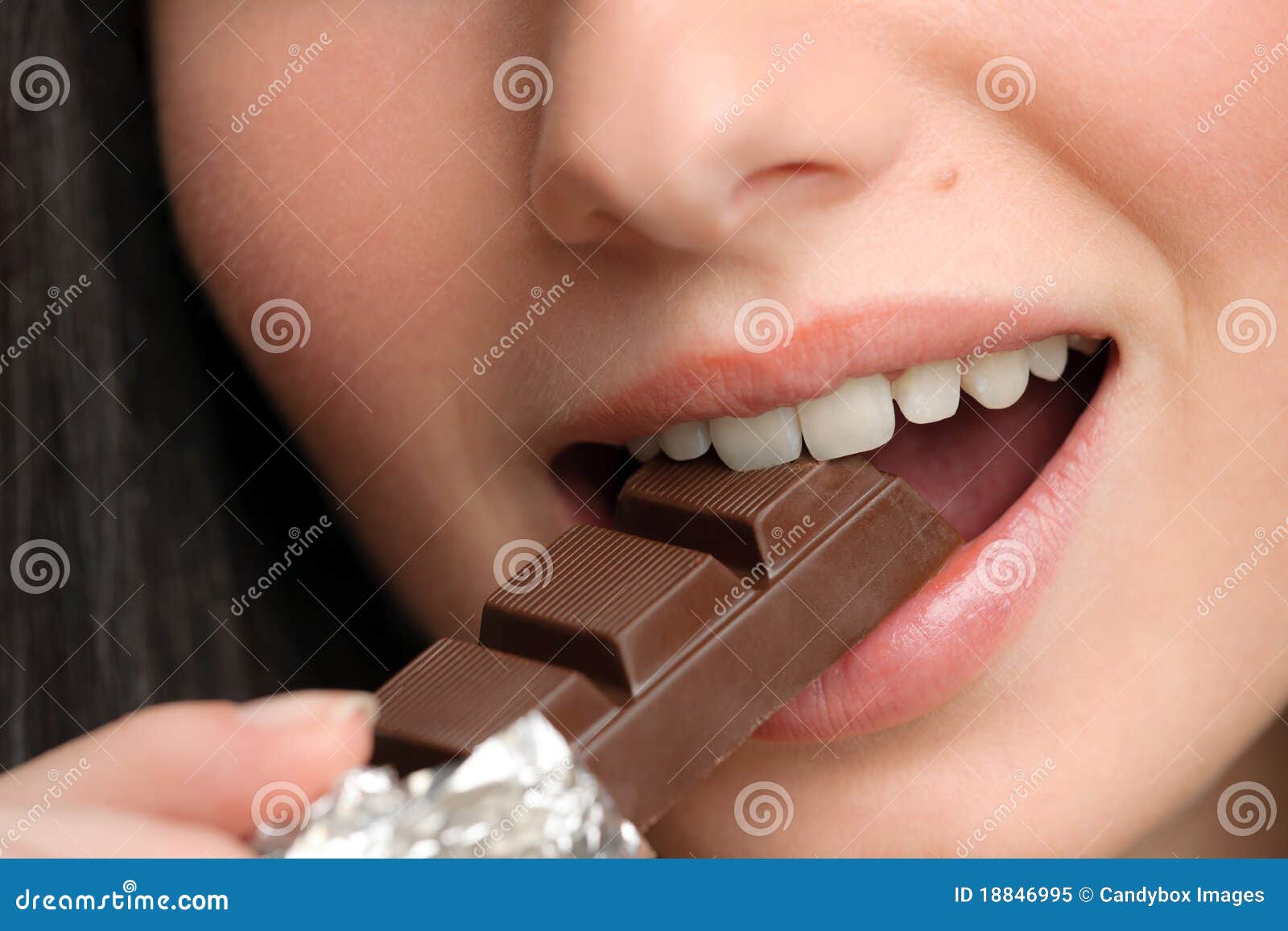 Chocolate - Close-up of Young Woman Bite Piece Stock Image - Image of ...