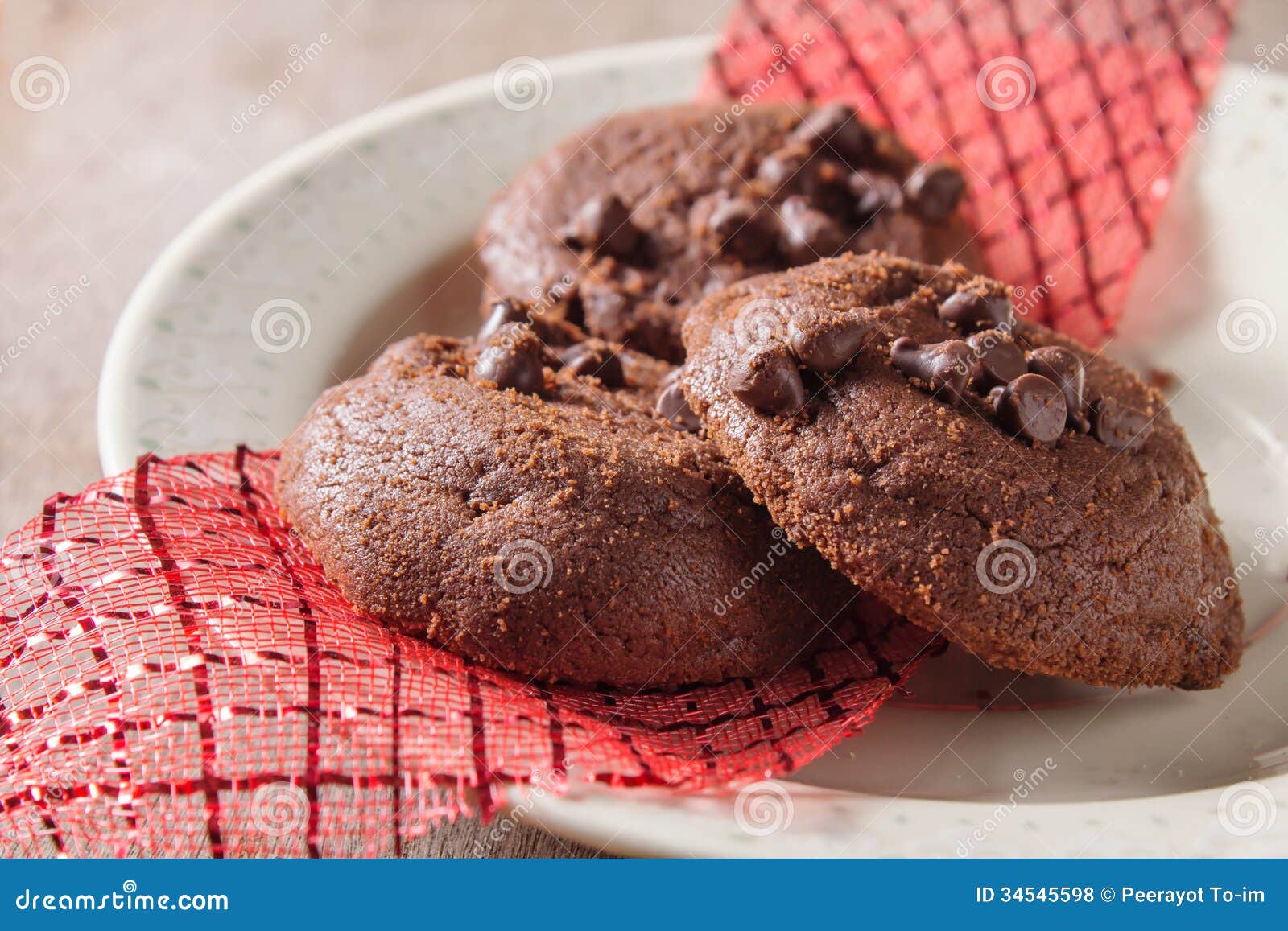 Chocolate cookies on dish. stock photo. Image of baked - 34545598