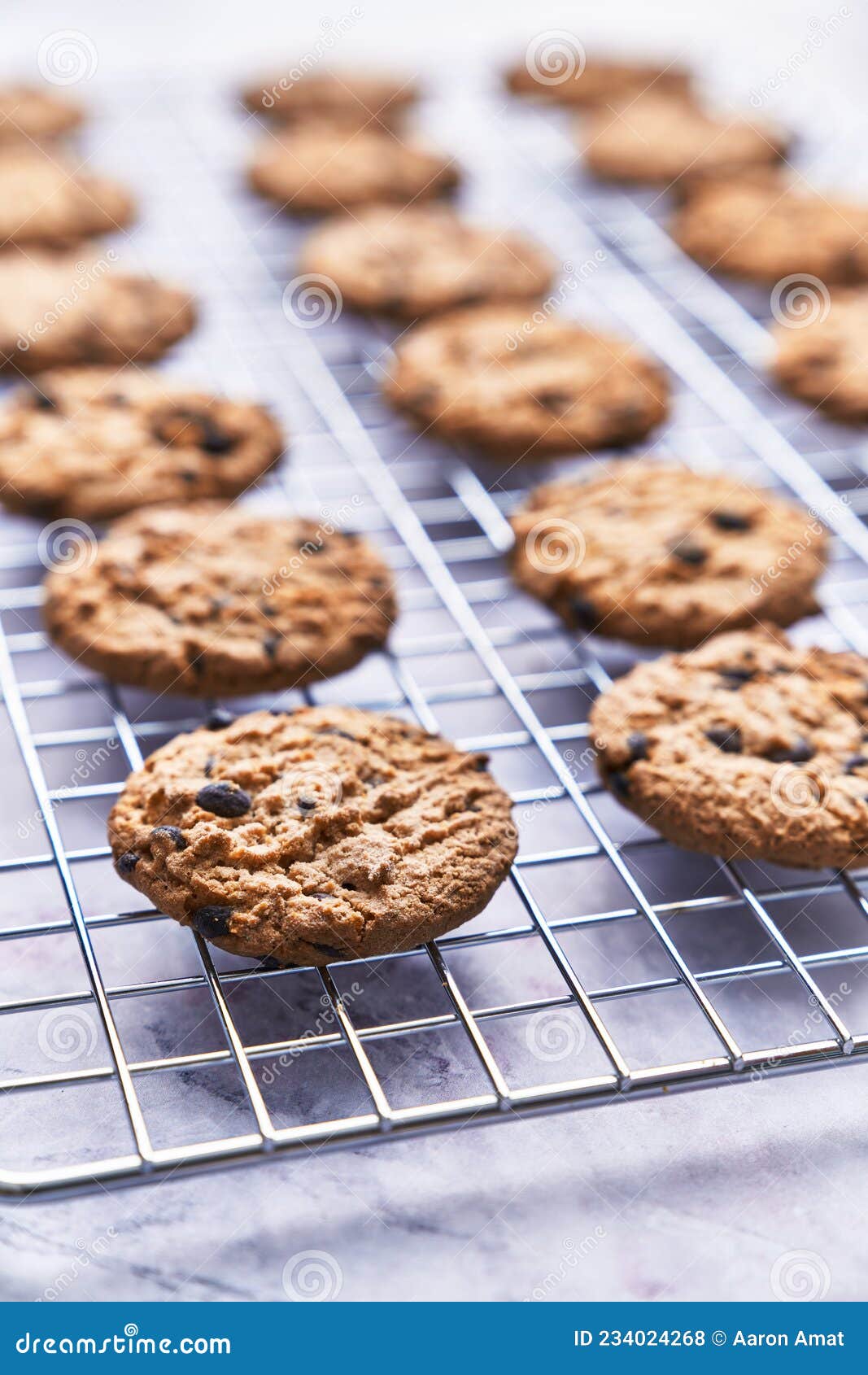 Chocolate Cookies Served on a Grid Rack on a Marble Table Stock Photo ...