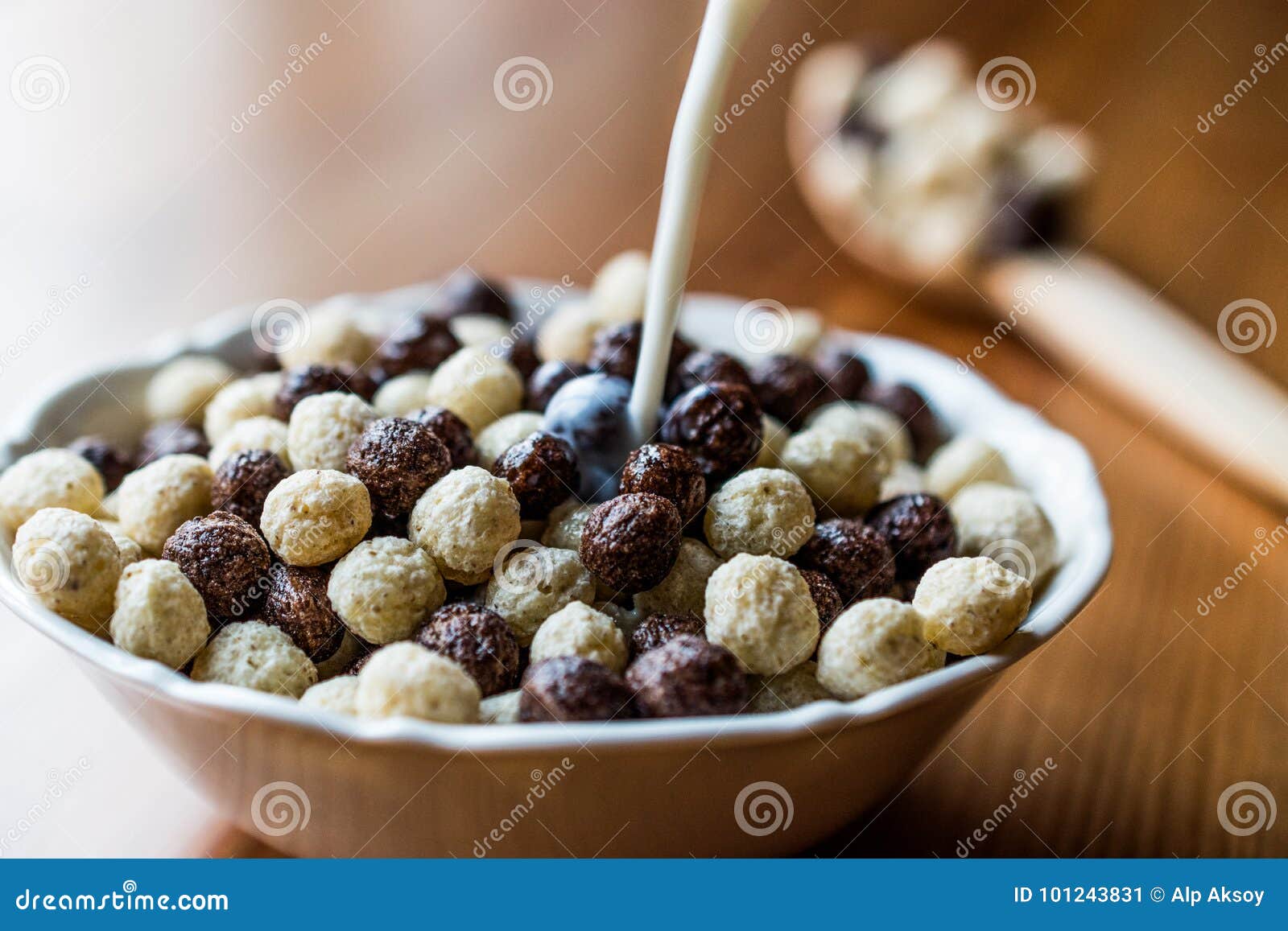 Chocolate Corn Balls with Milk Pouring Stock Image - Image of cereals ...