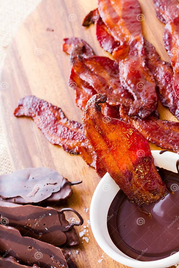 Chocolate covered bacon stock photo. Image of dipped - 290247216