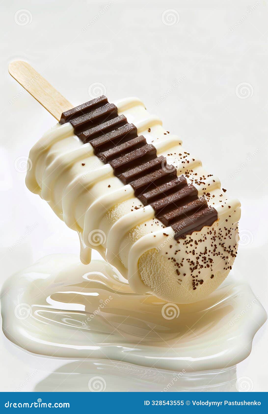 A Chocolate Covered Ice Cream on a Stick with a Splash of Milk Stock ...