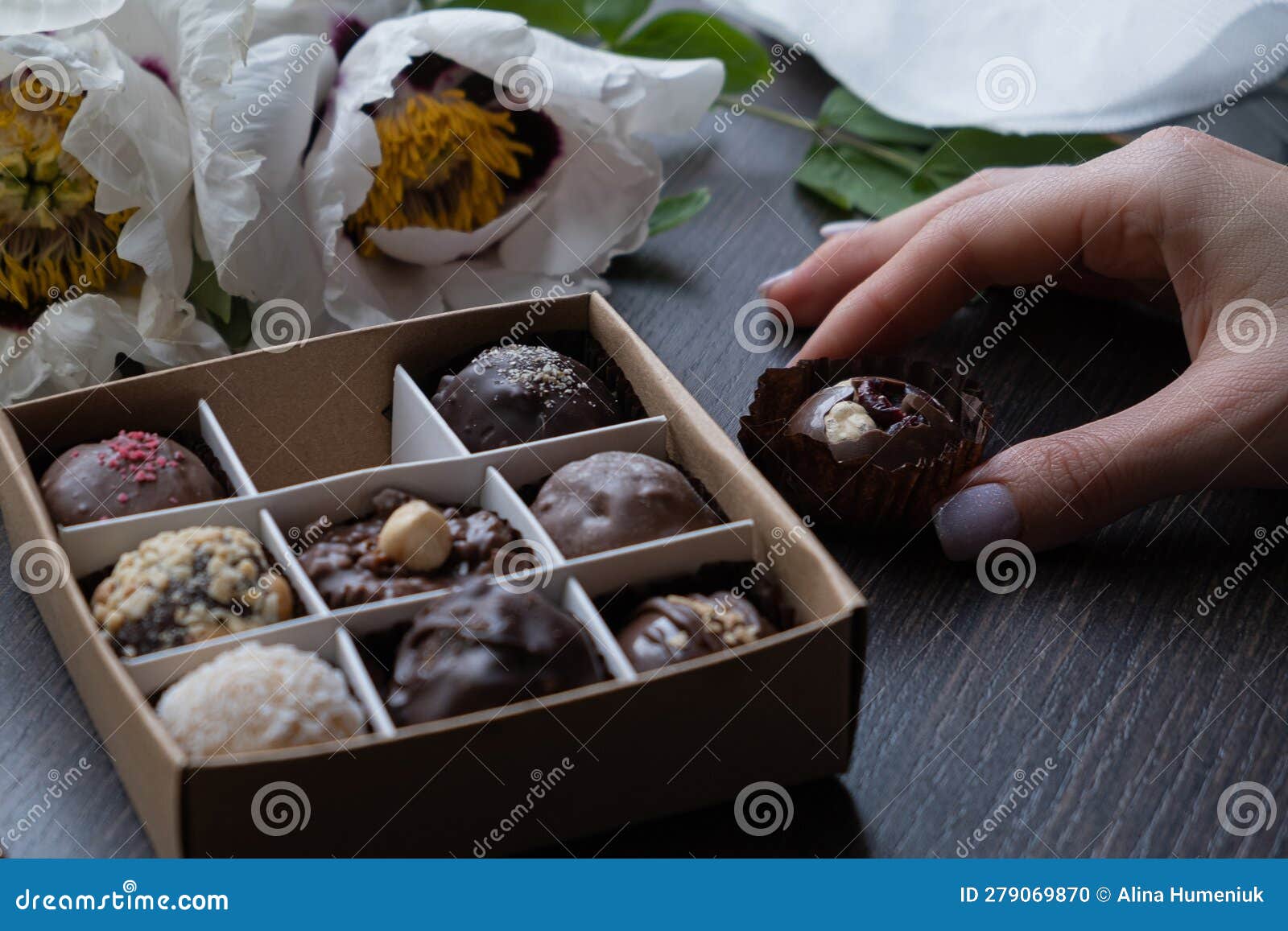 Chocolate Craft Candy in Female Hand and Candy Box Stock Photo - Image ...