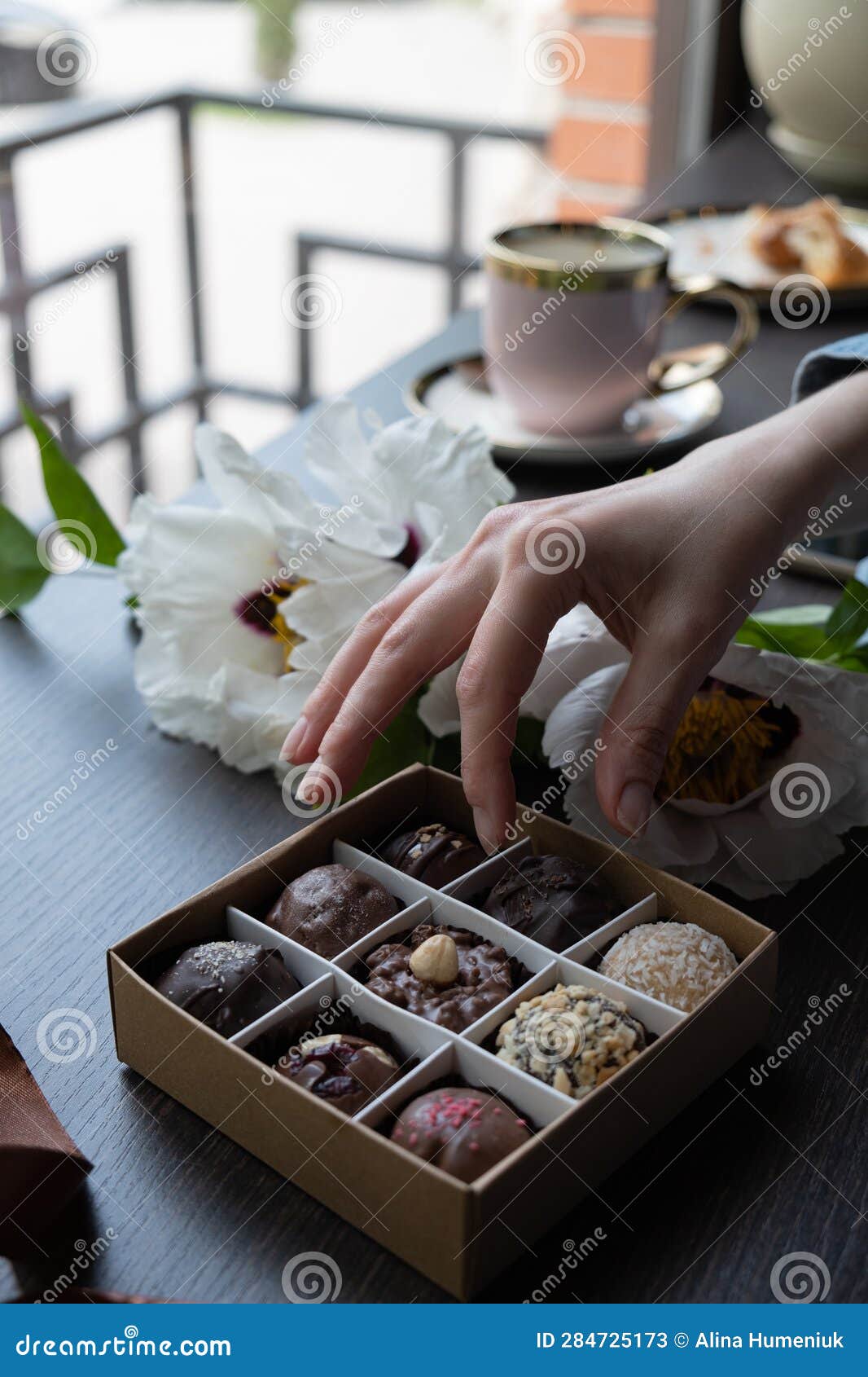 Chocolate Craft Candy in Female Hand and Candy Box Stock Image - Image ...