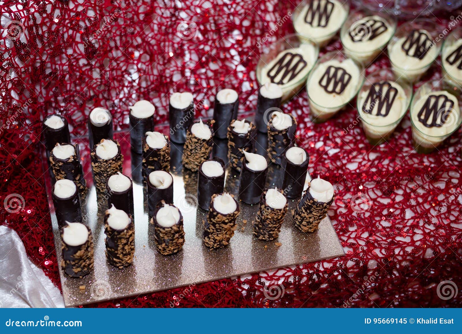 Chocolate cylinders stock image. Image of plate, pastry - 95669145